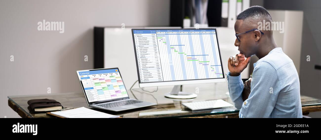 Gantt Chart Calendar Schedule On Multiple Computers Stock Photo - Alamy