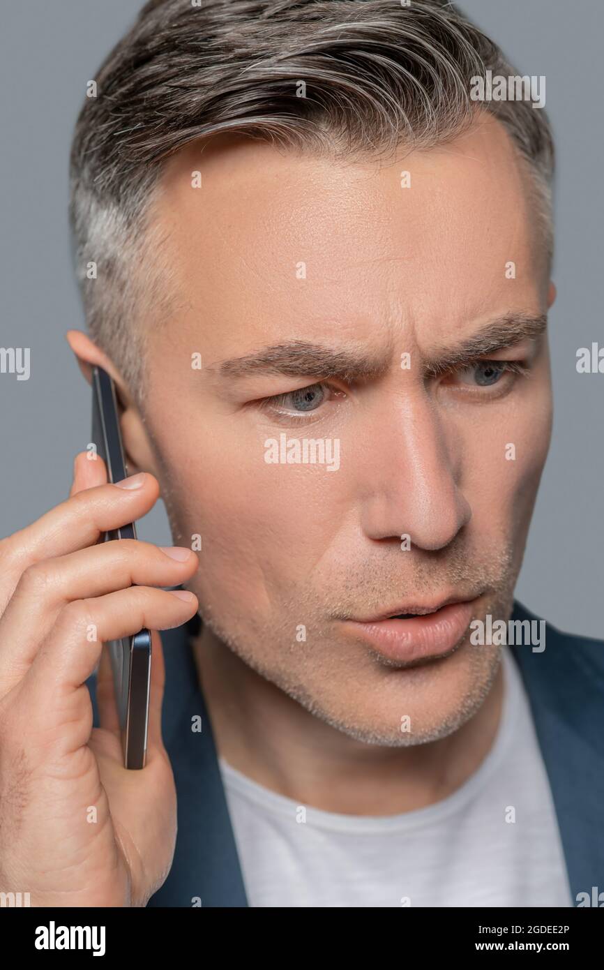 Alarmed man hi-res stock photography and images - Alamy