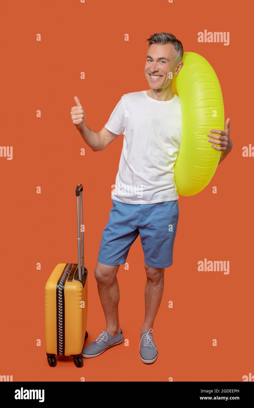 Yellow inflatable ring hi-res stock photography and images - Alamy