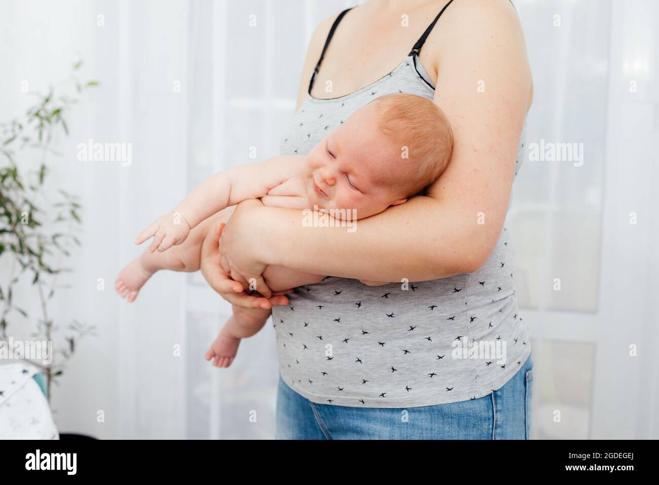 Normal situation for mother to be tired of child upbringing Stock Photo ...