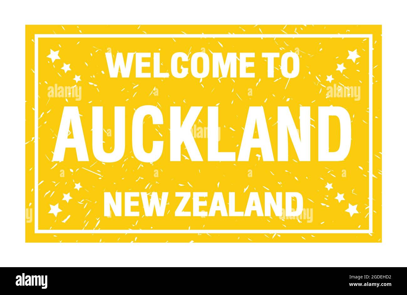 WELCOME TO AUCKLAND - NEW ZEALAND, words written on yellow rectangle ...