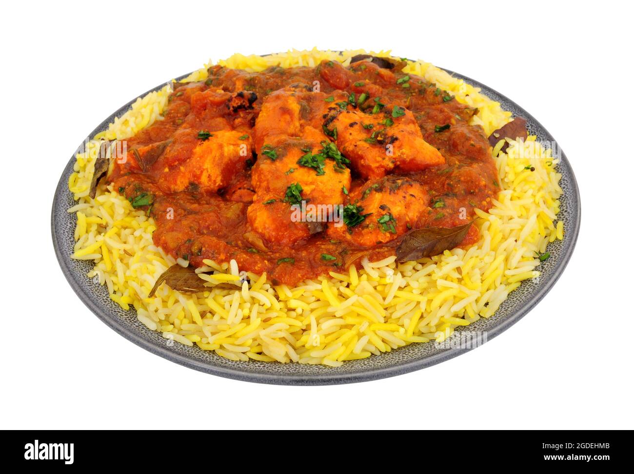 Indian chicken jalfrezi curry meal with fragrant pilau rice isolated on ...