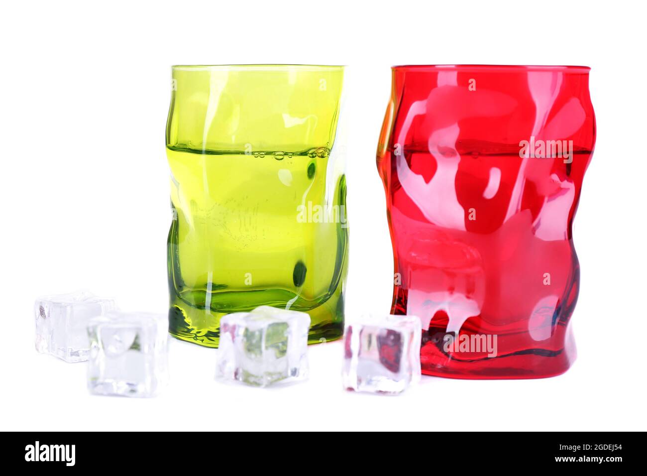 Colorful glasses and ice cubes isolated on white Stock Photo - Alamy