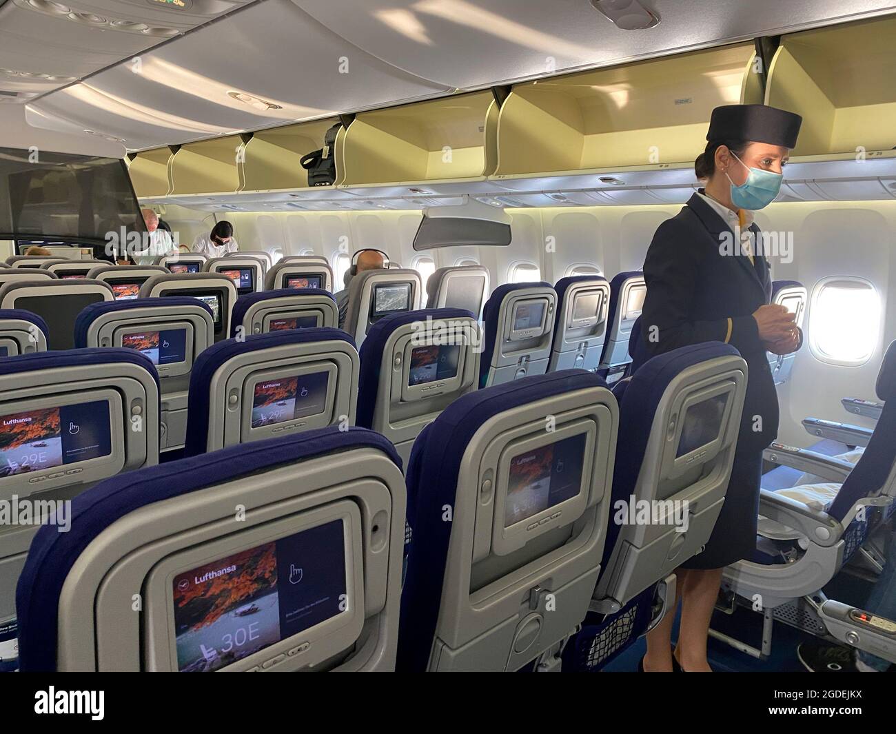 Lufthansa stewardess hi-res stock photography and images - Alamy