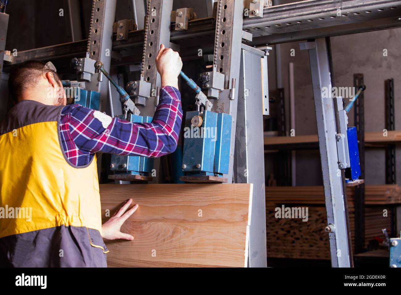 Closeup view man holding hydraulic press lever Stock Photo - Alamy