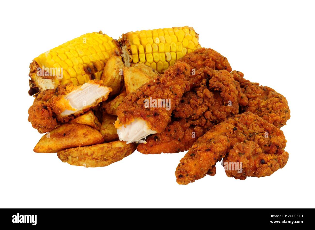 Fried spicy breadcrumb covered chicken fillets and potato wedges with ...