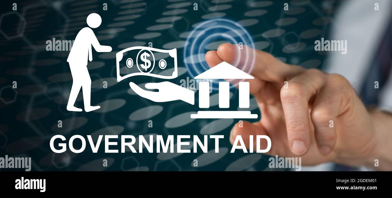 Man touching a government aid concept on a touch screen with his finger ...