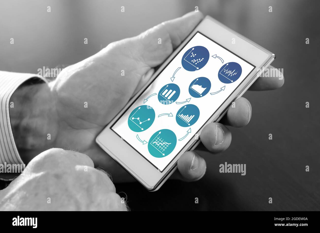 Hand holding a smartphone with business analysis concept Stock Photo ...