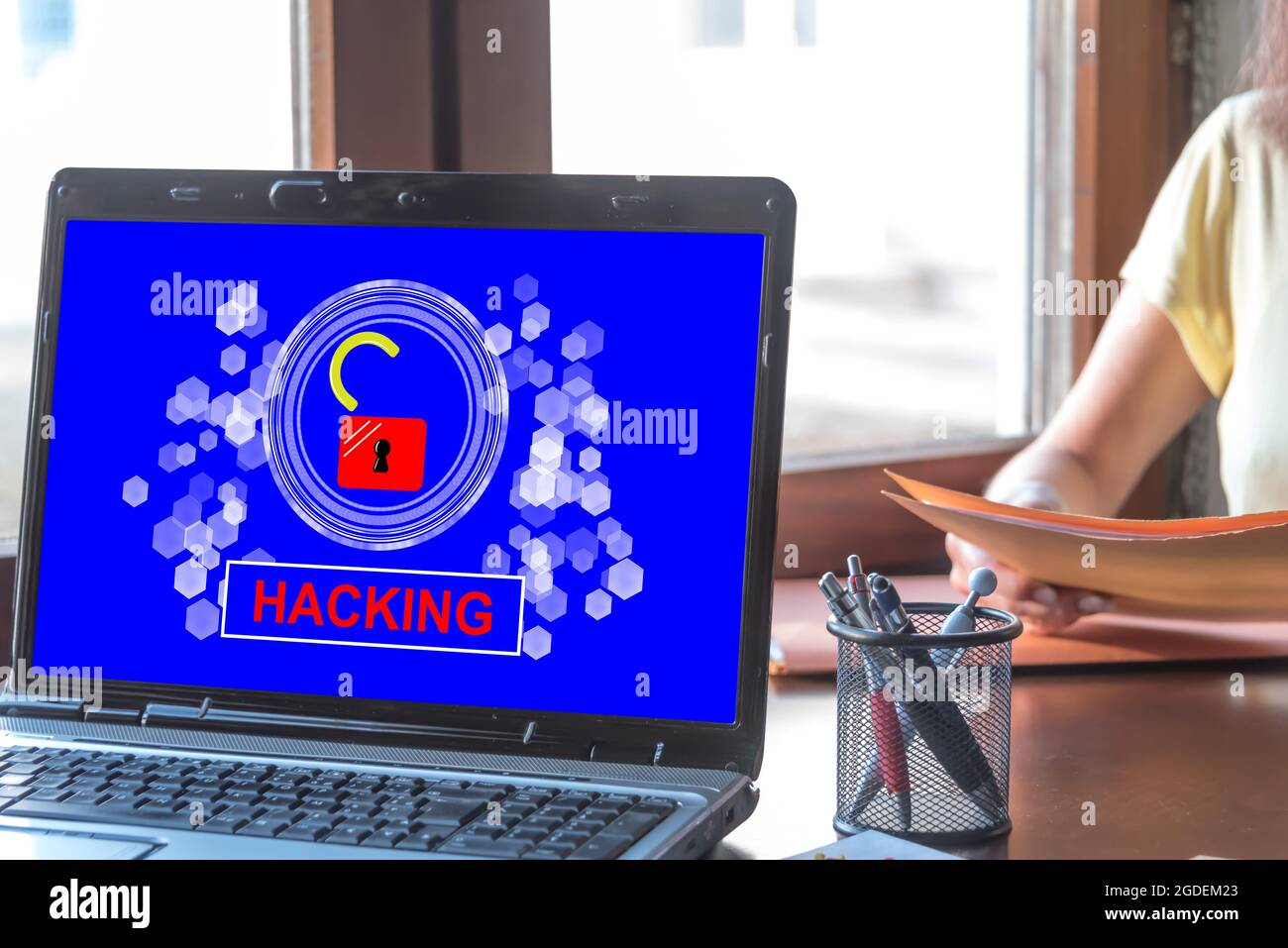 Laptop screen displaying a hacking concept Stock Photo - Alamy