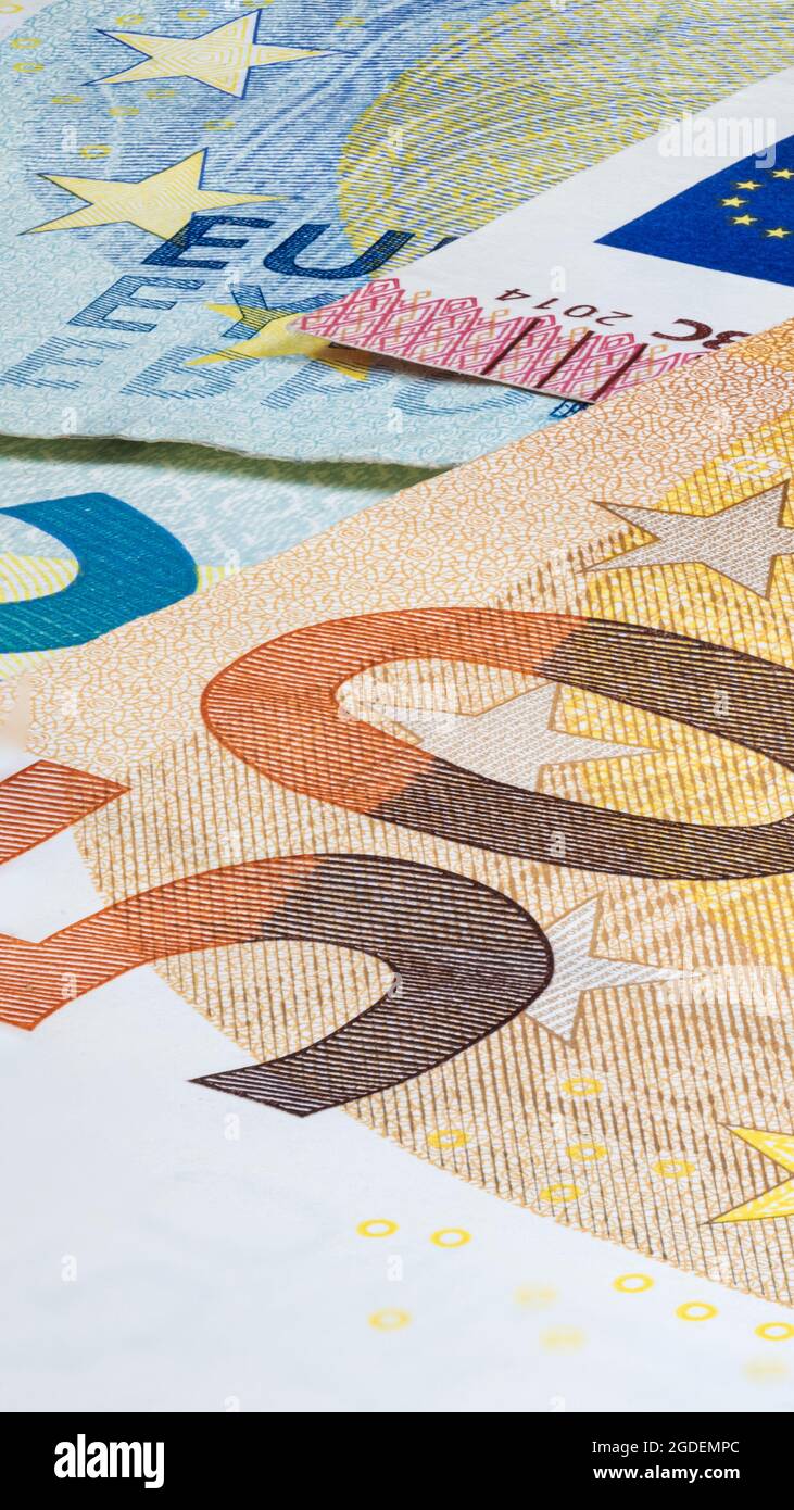 Macro close up on the design surface of 50 euro notes. Banknotes of the ...