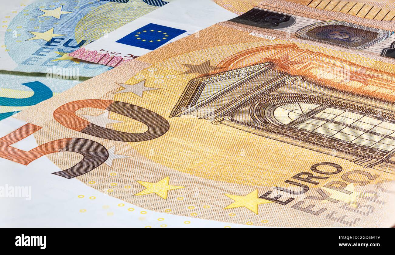 Macro close up on the design surface of 50 euro notes. Banknotes of the ...