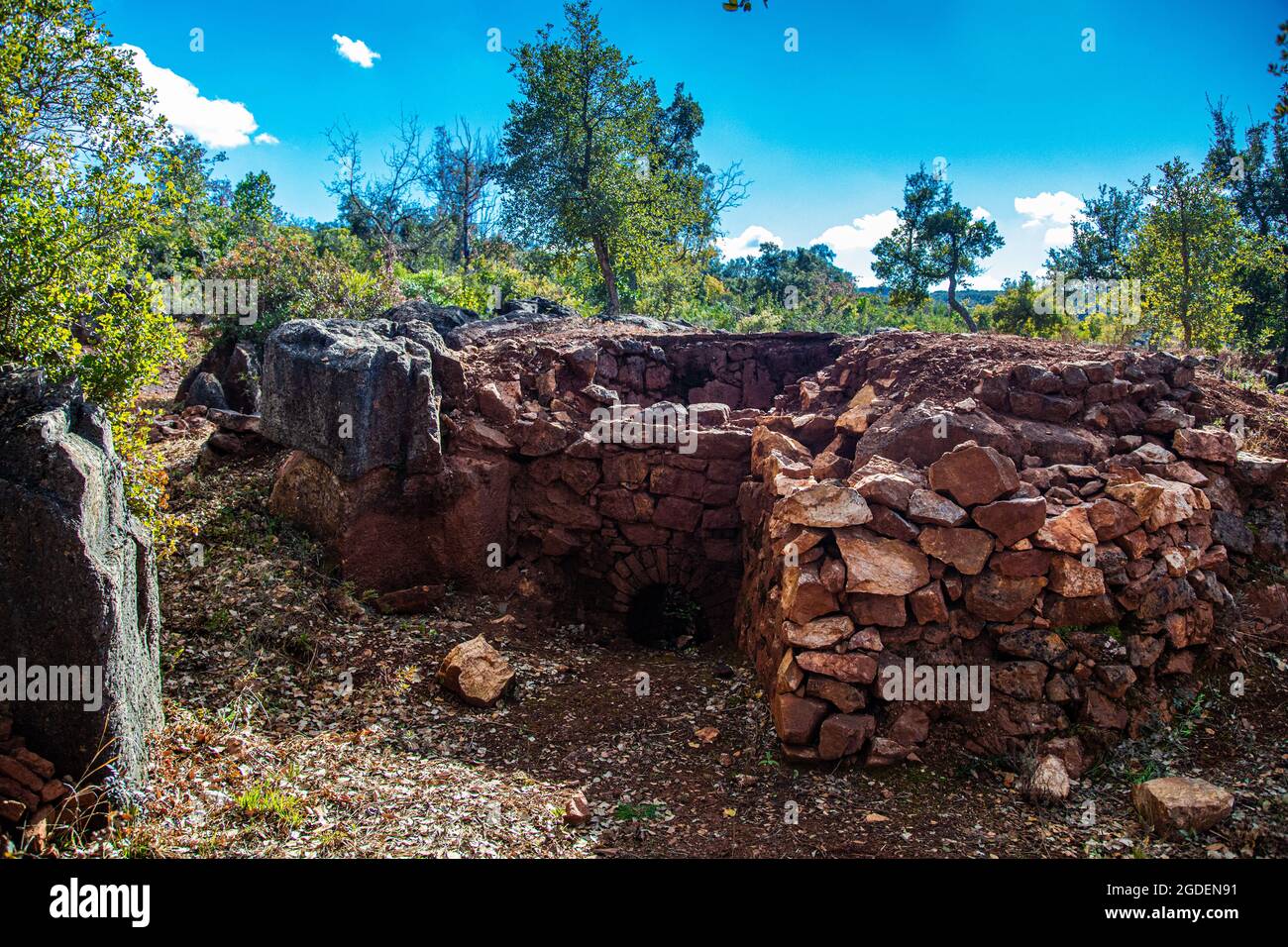 Natural park of eroded stone and red sand forest, with abandoned iron ...
