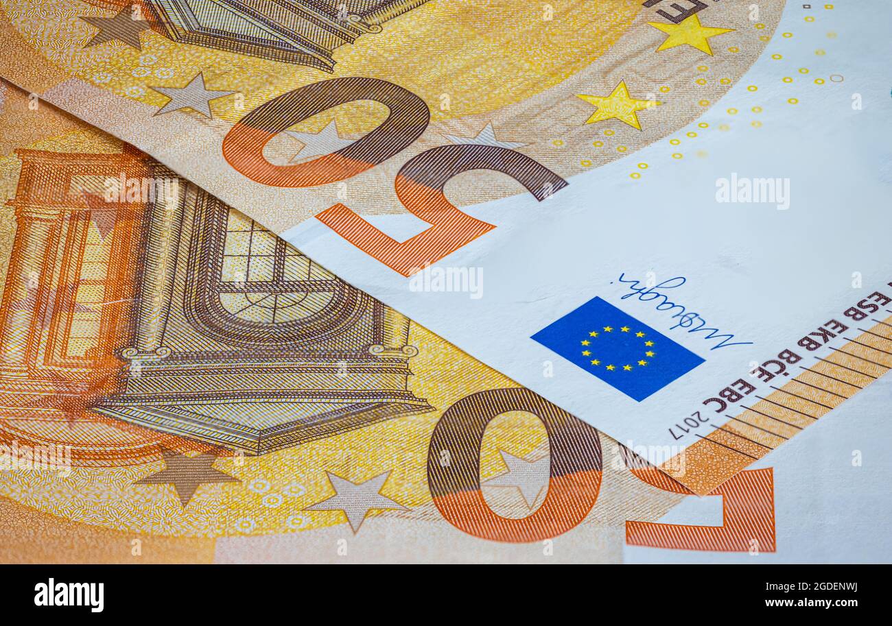 Close up on 50 Euro banknote with the European flag. Euro, currency of ...