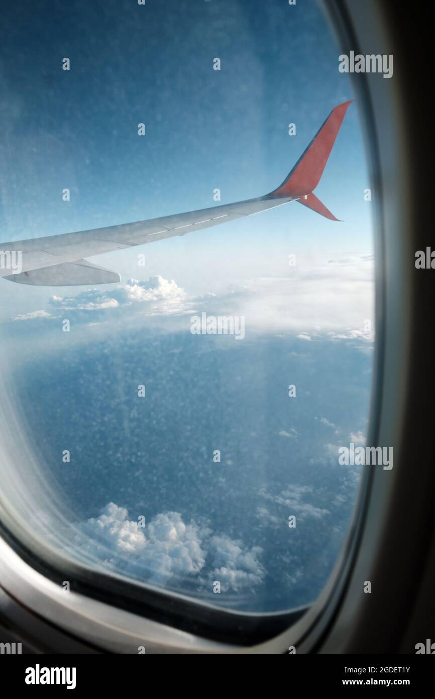 Window of the Illuminator in the plane. Look at the clouds and the ...