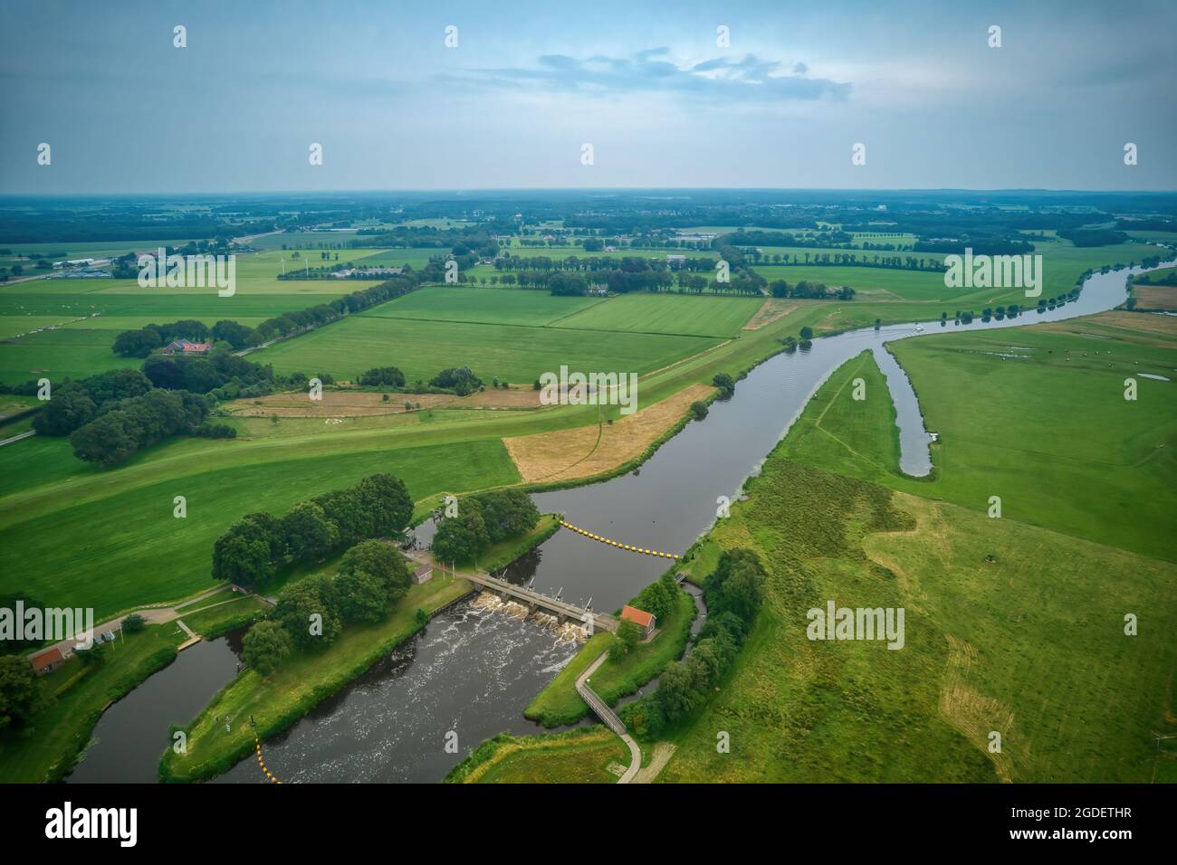 Airial view of a weir in the river Vecht. Dutch river in a colorful ...