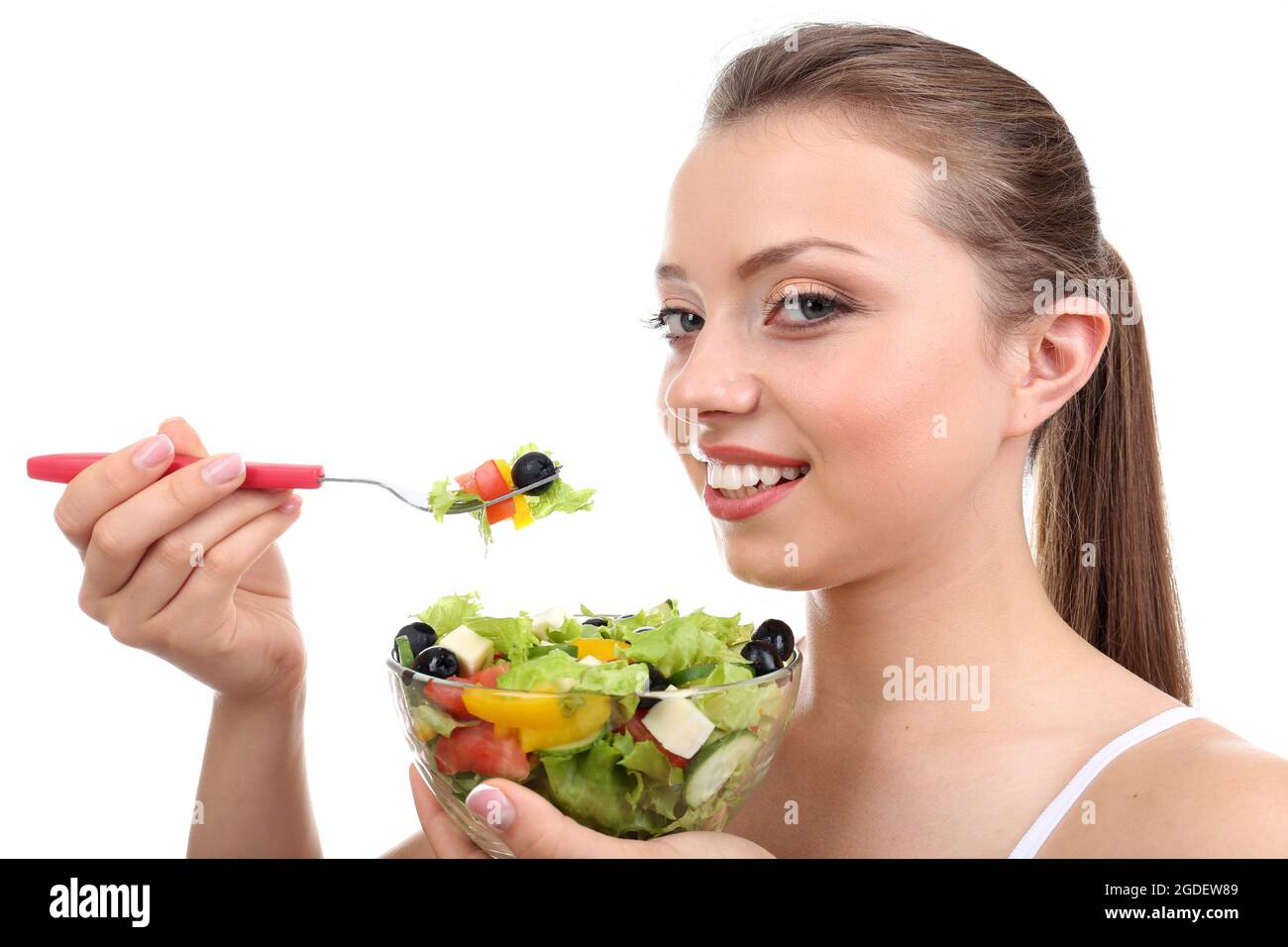 Beautiful girl with fresh salad, isolated on white Stock Photo - Alamy