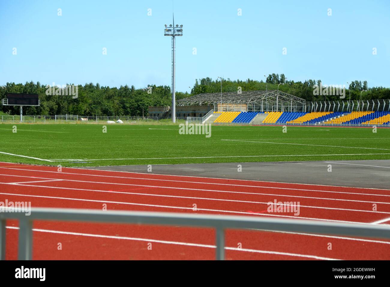 Empty stadium arena with football field and running tracks Stock Photo ...