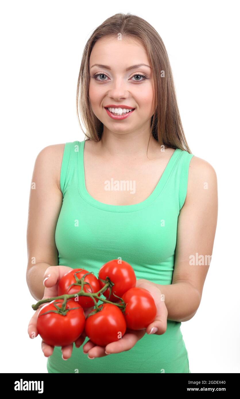 Beautiful girl with tomato, isolated on white Stock Photo - Alamy