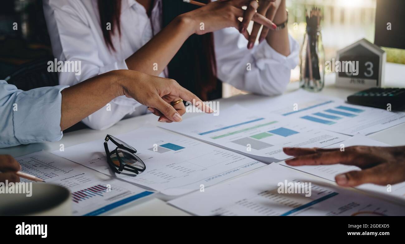 Close up business people discussing ideas in the office. Creative ...
