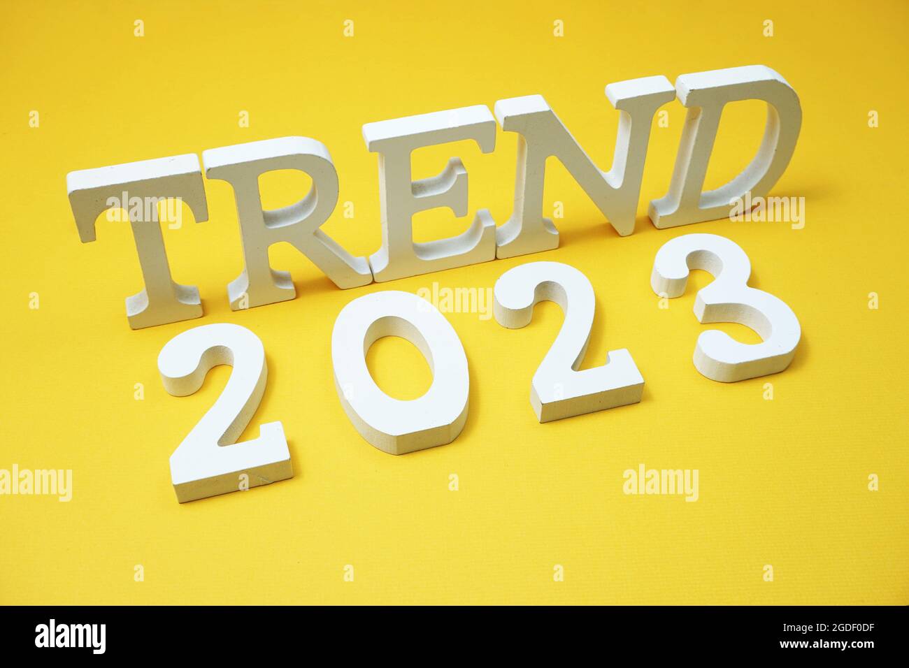 Trend 2023 alphabet letter on yellow background Stock Photo - Alamy