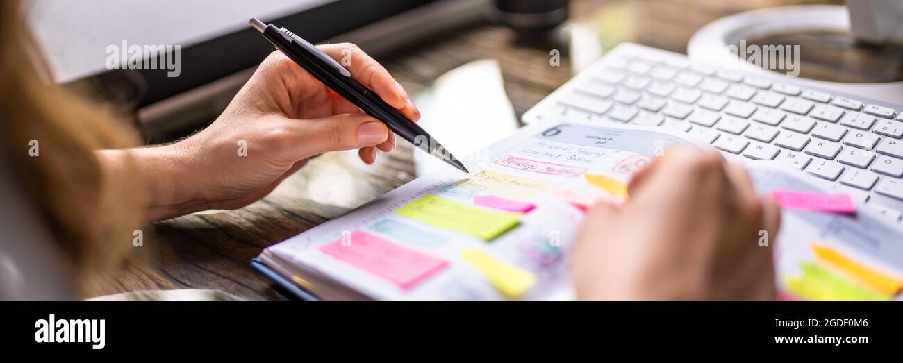 Event Organizer In Calendar Plan In Diary Stock Photo - Alamy