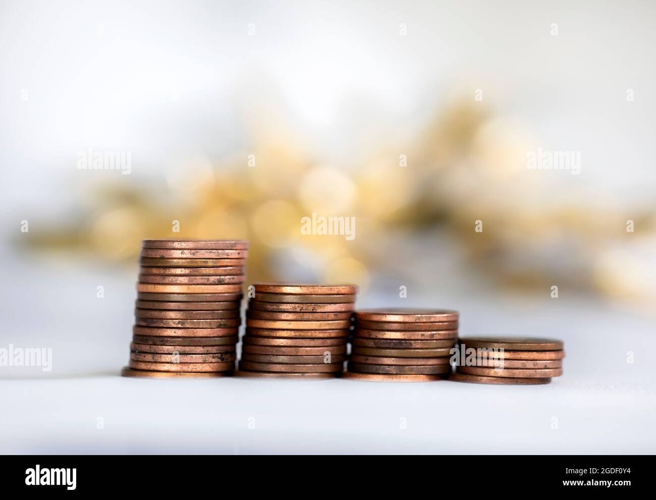 Stack of coins, money climbing stairs with bokeh background, Finance ...