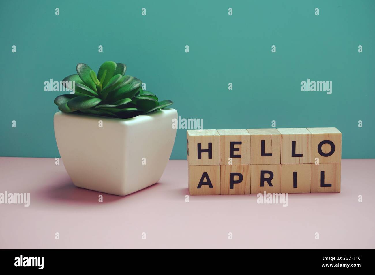 Hello April alphabet letter on blue and pink background Stock Photo - Alamy