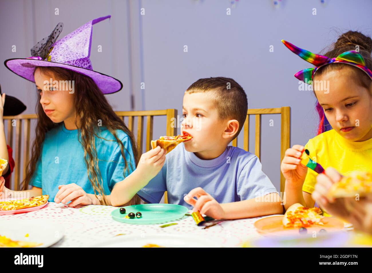 the little girl is grieving at the birthday party Stock Photo - Alamy