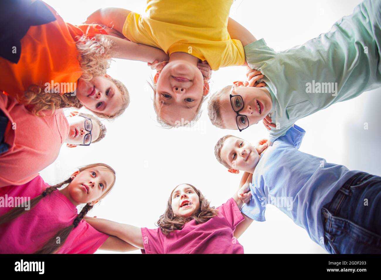 the group of little kids greeting at the camera Stock Photo - Alamy