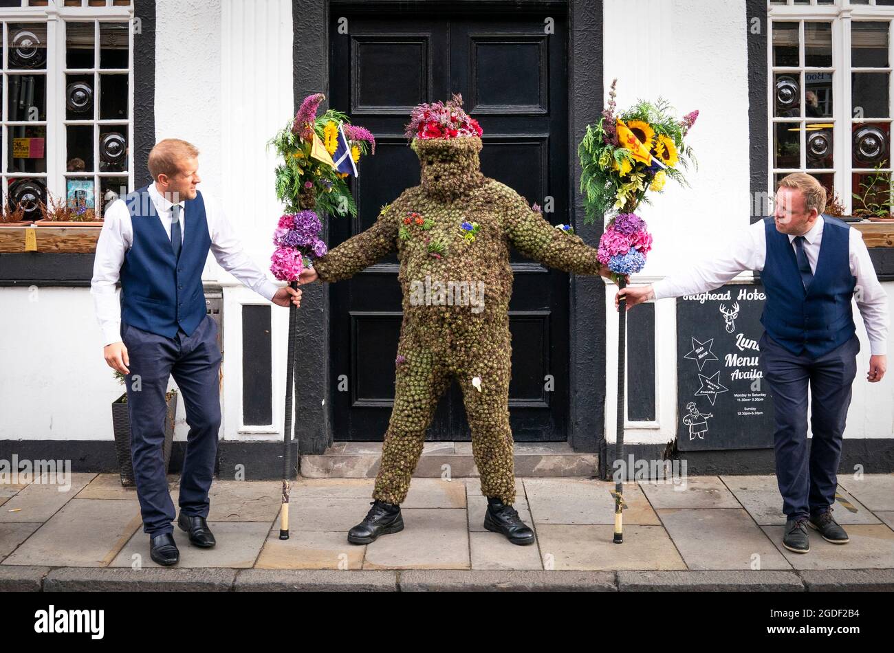 Burryman Andrew Taylor parades through the town of South Queensferry ...