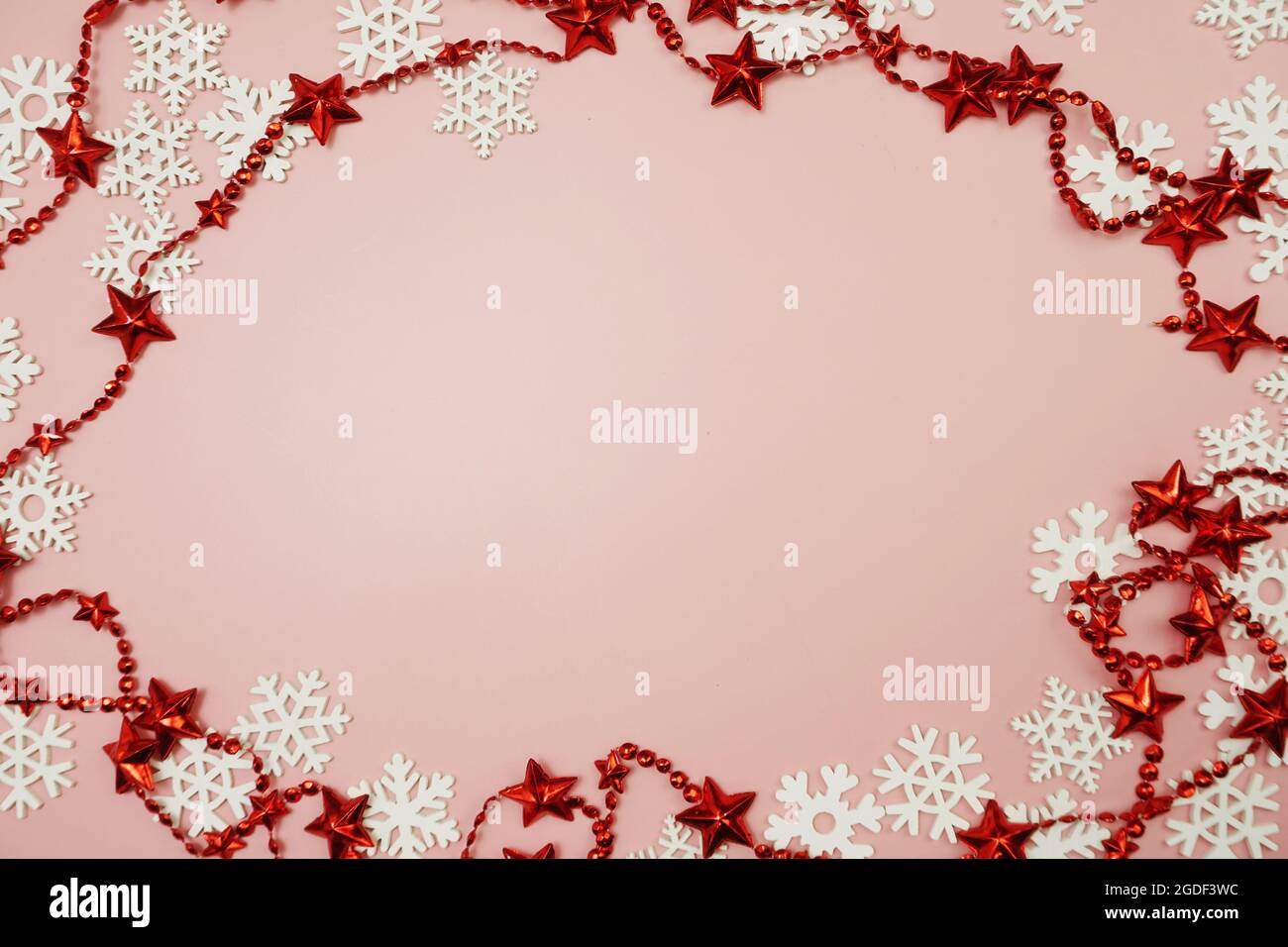 Christmas Ornament border frame on pink background Stock Photo - Alamy