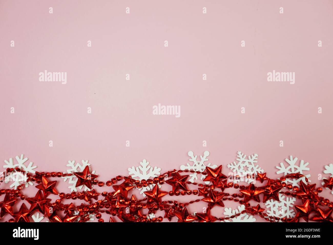 Christmas Ornament border frame on pink background Stock Photo - Alamy