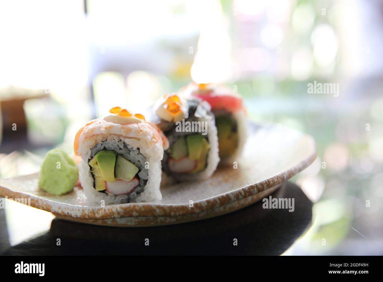 Mix maki sushi roll japanese food in black background Stock Photo - Alamy