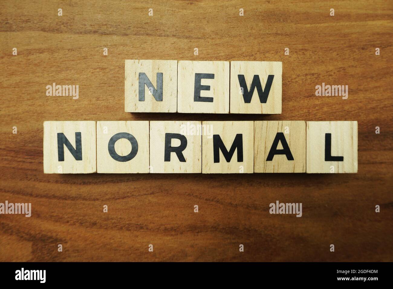 New Normal alphabet letters on wooden background Stock Photo - Alamy