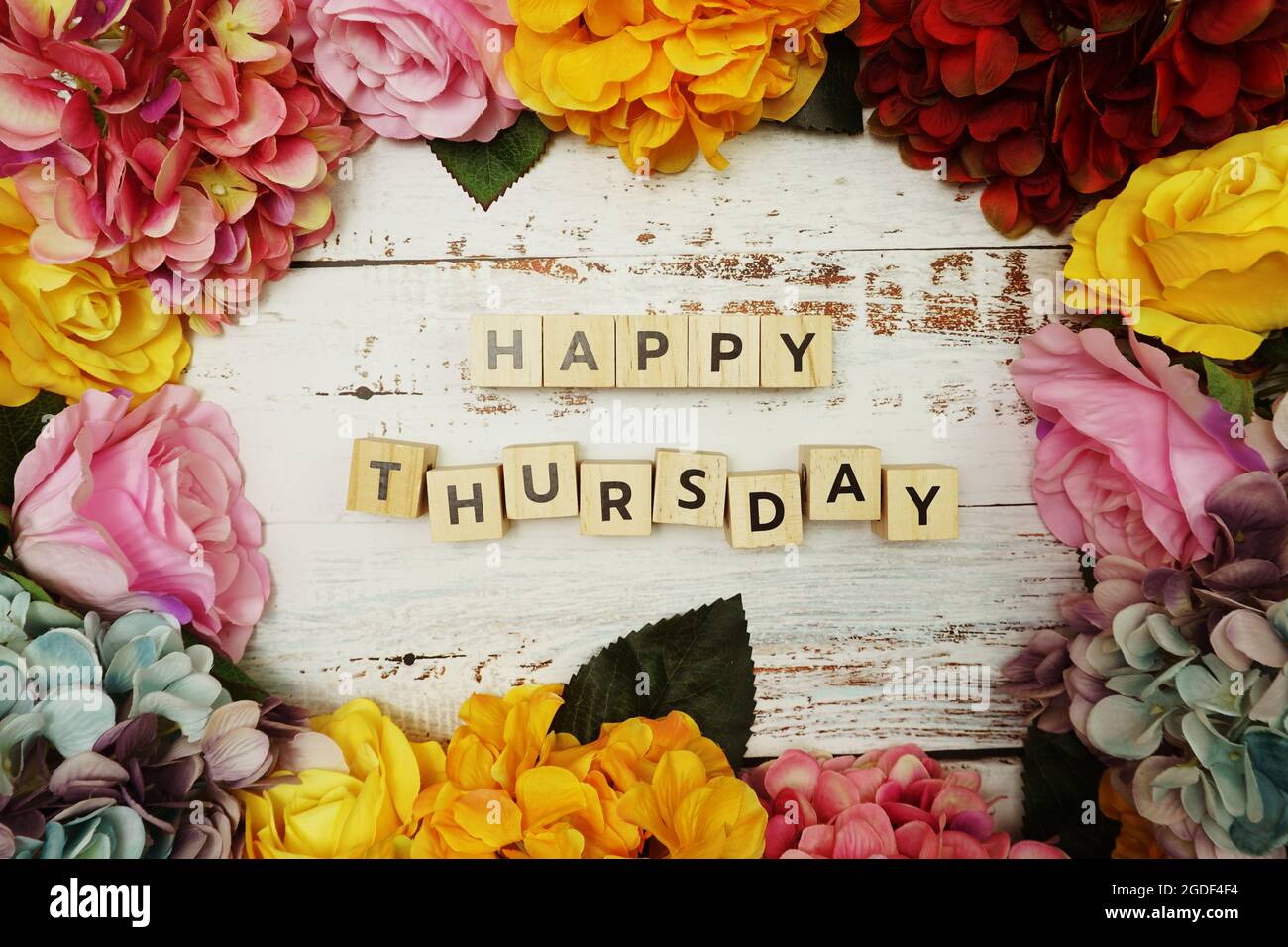 Hello Thursday alphabet letter with colorful flowers border frame on ...