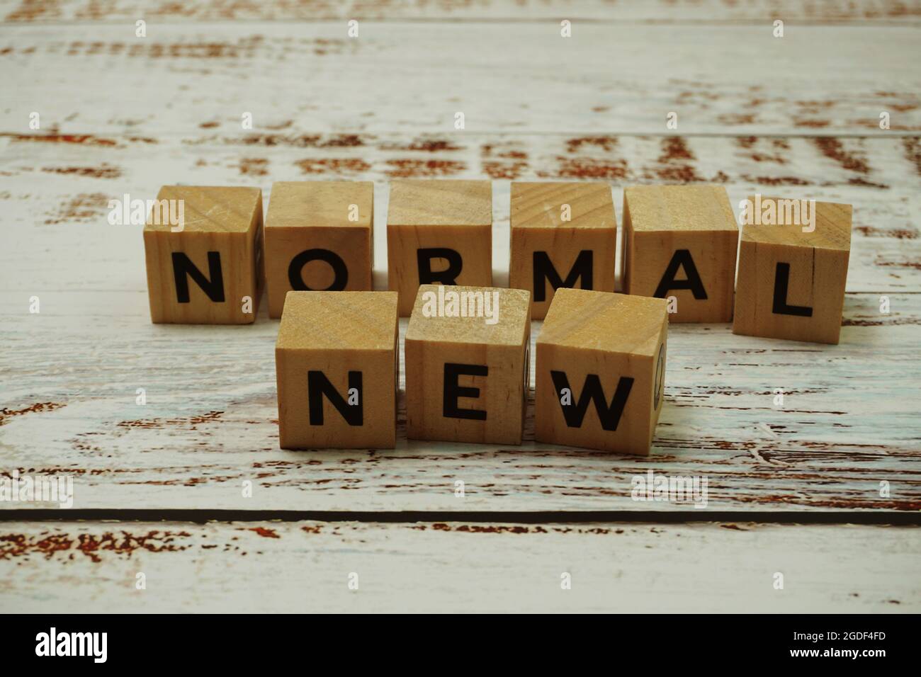 New Normal alphabet letters on wooden background Stock Photo - Alamy