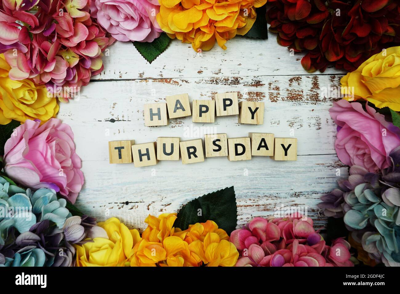 Happy Thursday alphabet letter with colorful flowers border frame on ...