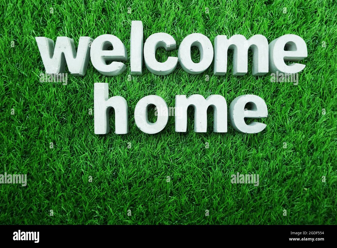 Welcome Home made from concrete alphabet Stock Photo - Alamy