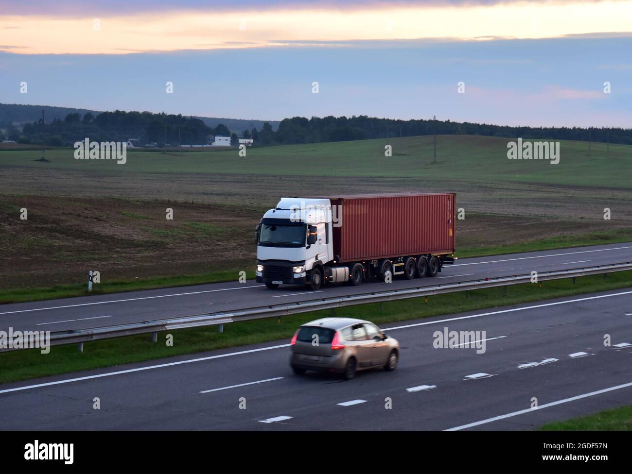 Semi Truck transport the sea container on highway. Shipping Containers ...