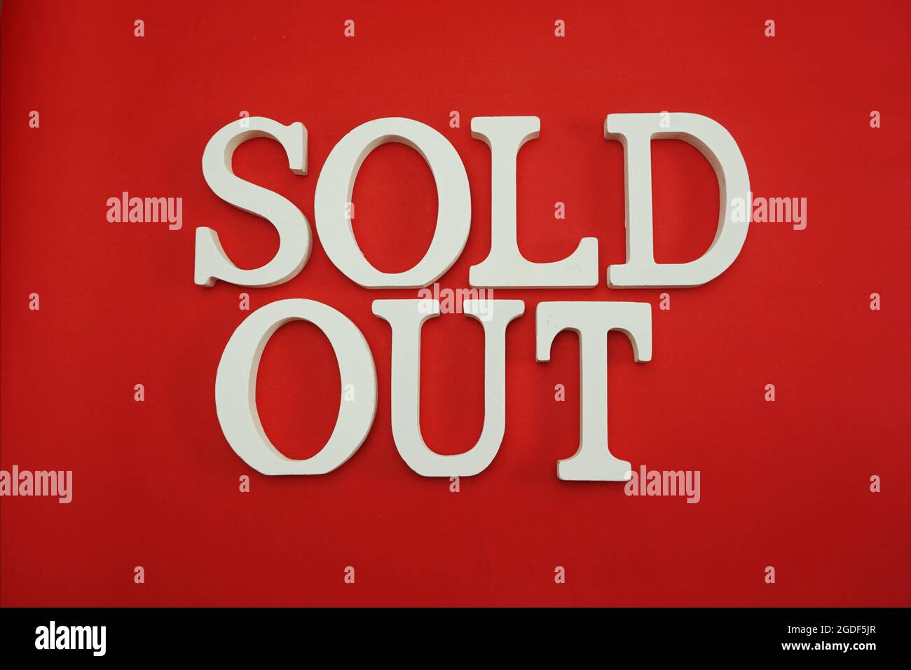 Top view of Sold Out alphabet letters on red background Stock Photo - Alamy