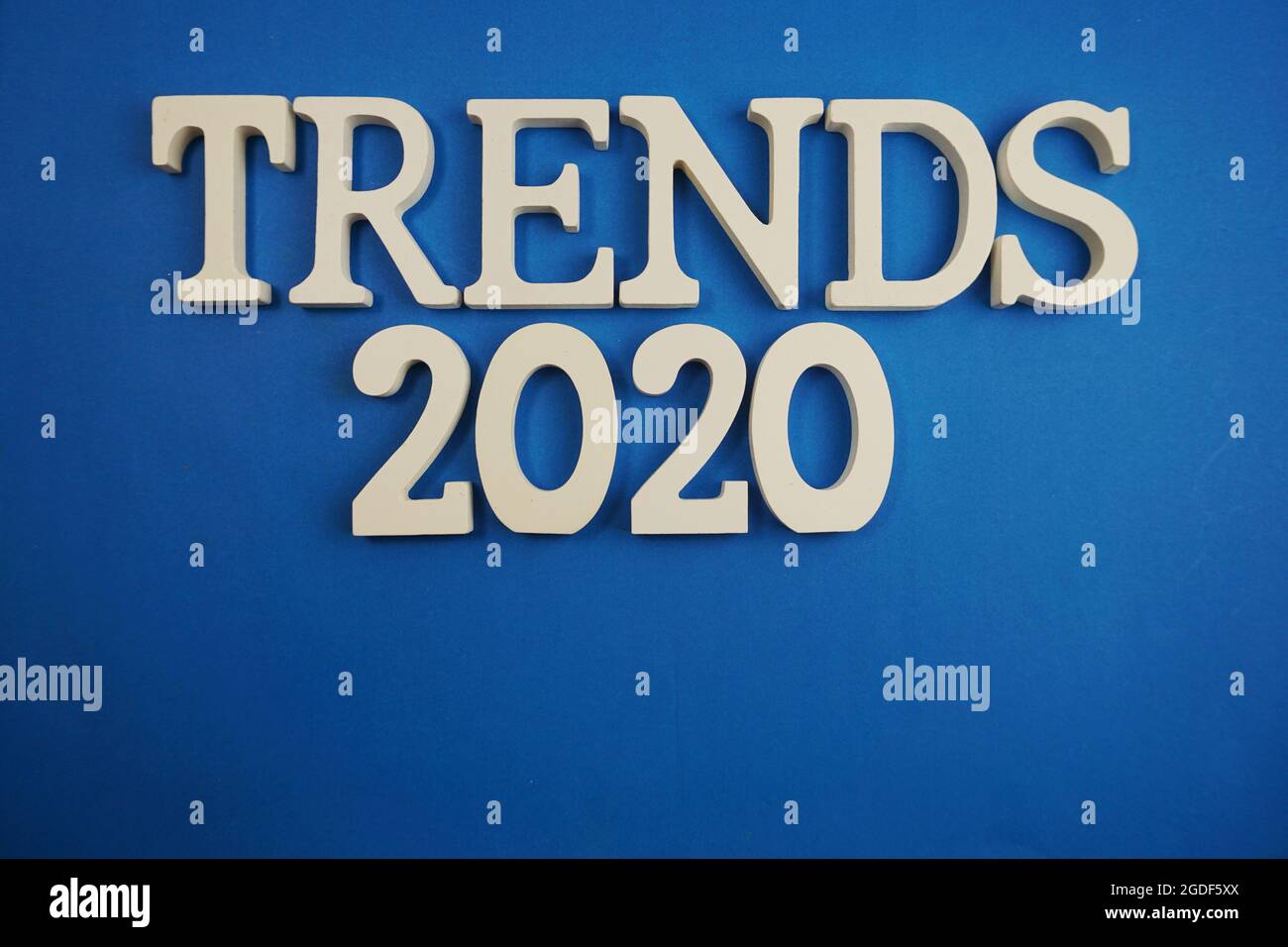 Trends 2020 word alphabet letters on blue background Stock Photo - Alamy