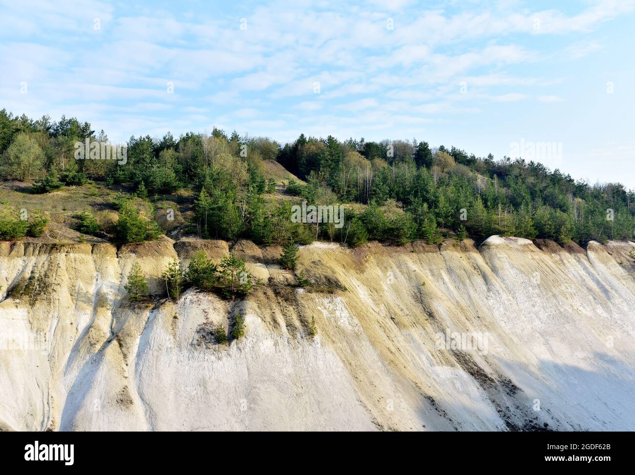 Chalk structure on artificial mountain after quarry mining. Technogenic ...