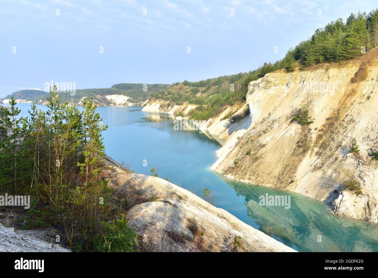 Artificial lake in a chalk quarry in Belarus at Krasnoselsky. Turquoise ...