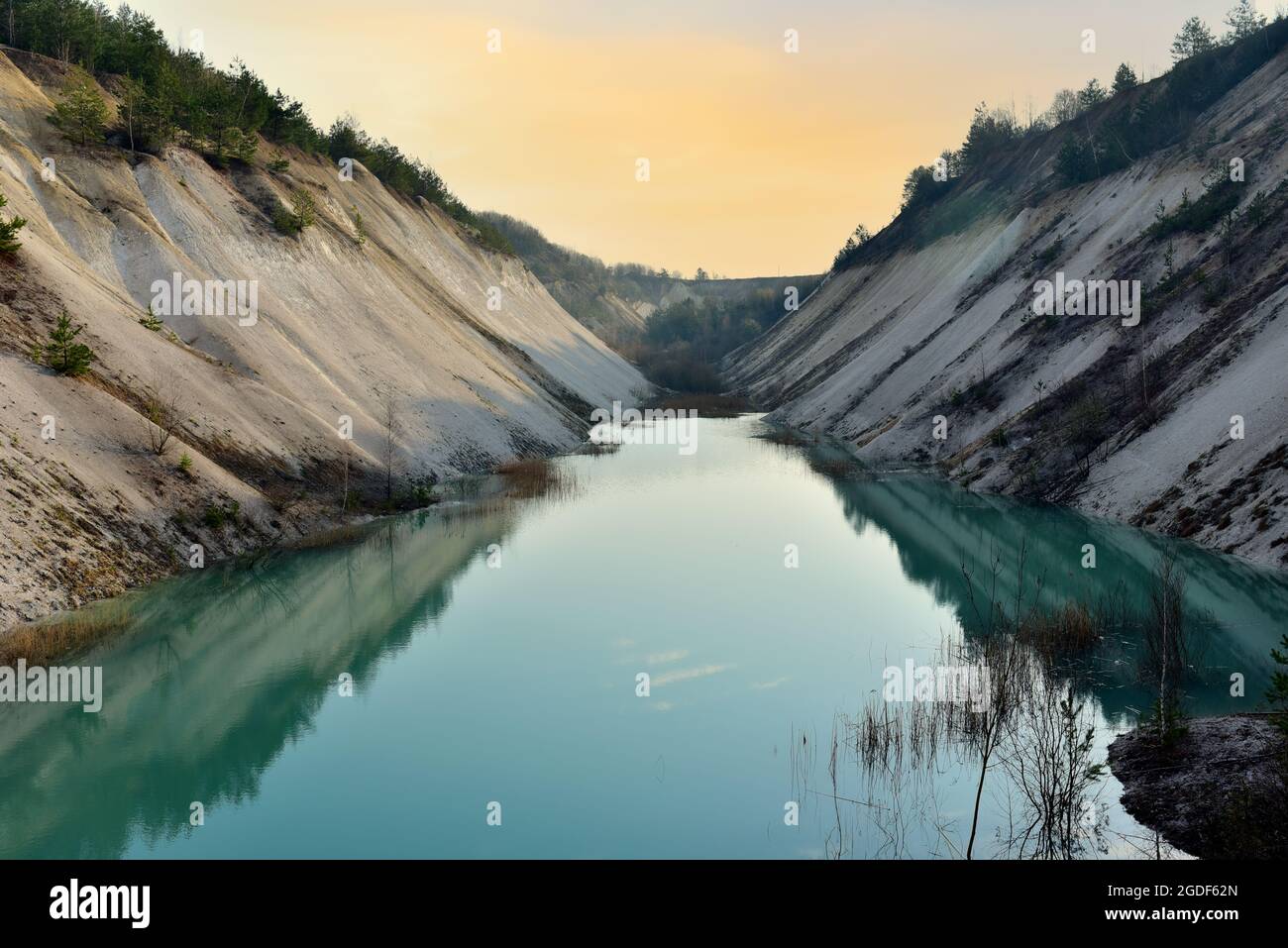 Artificial lake in a chalk quarry in Belarus at Krasnoselsky. Turquoise ...