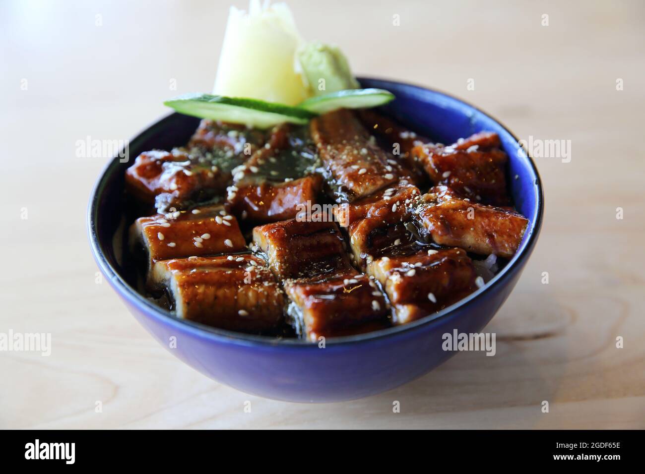 unagi don on wood background , Japanese food Stock Photo - Alamy