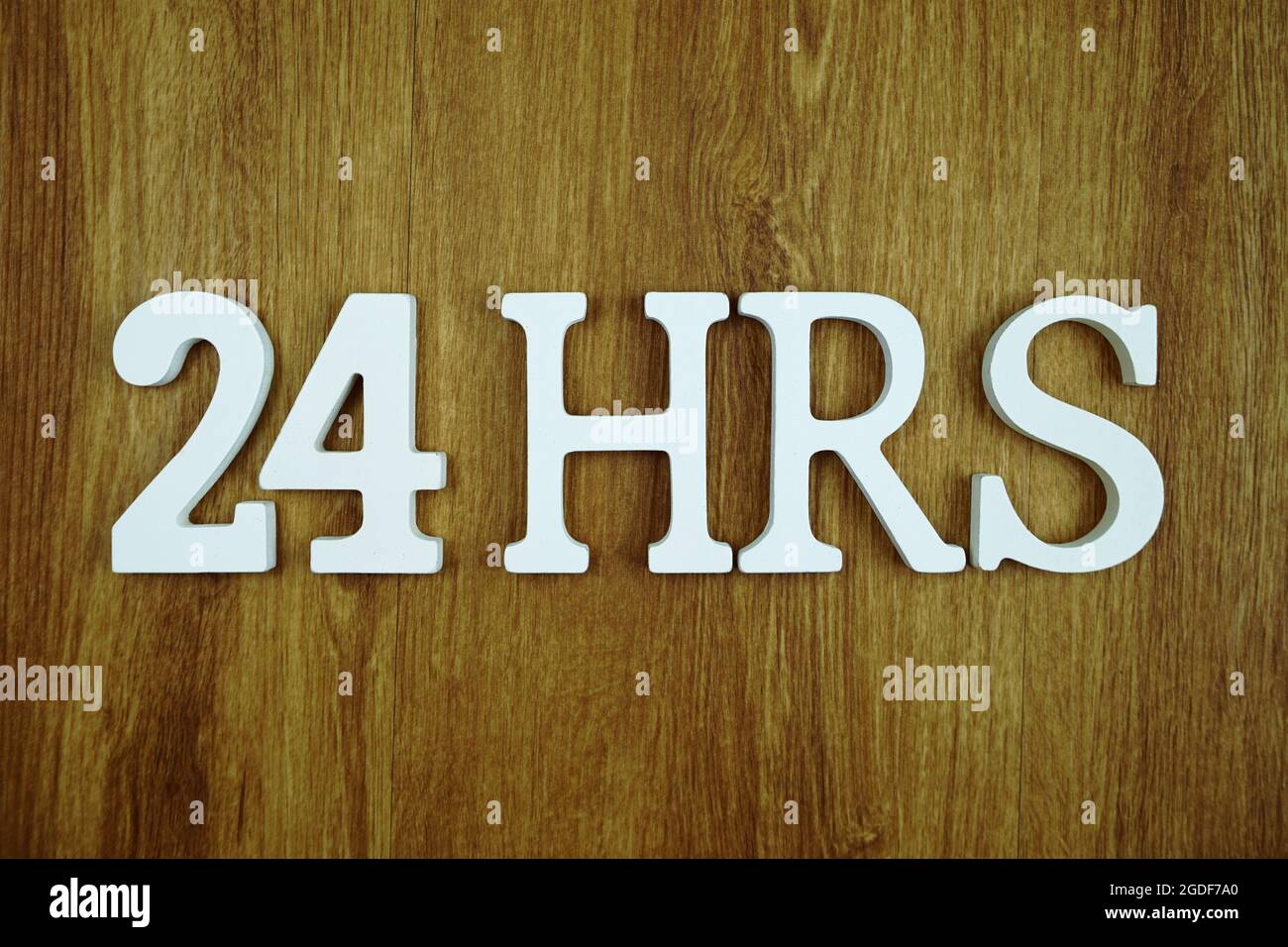 24 Hours alphabet letters on wooden background Stock Photo - Alamy