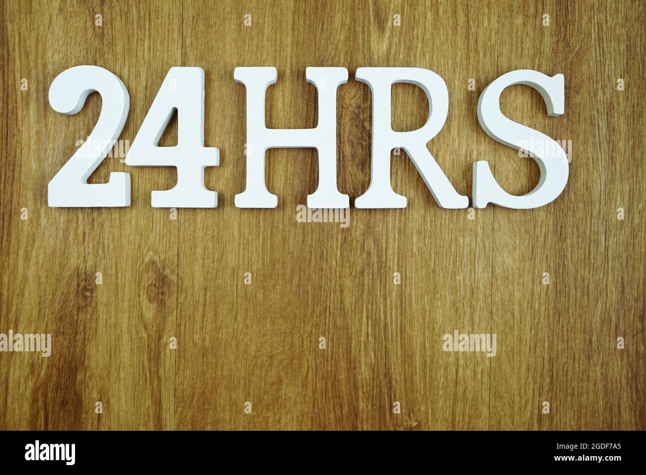 24 Hours alphabet letters on wooden background Stock Photo - Alamy