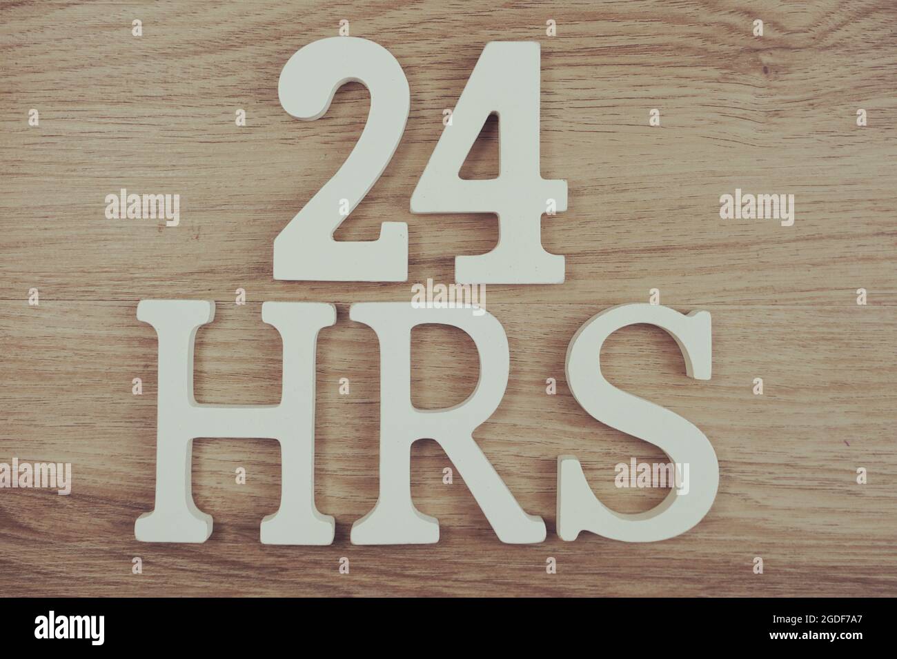 24 Hours alphabet letters on wooden background Stock Photo - Alamy