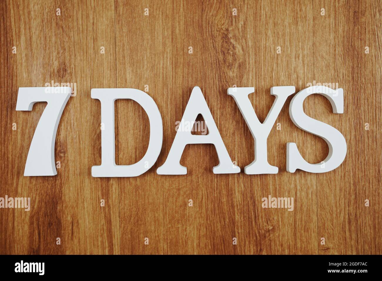 7 Days alphabet letters on wooden background Stock Photo - Alamy
