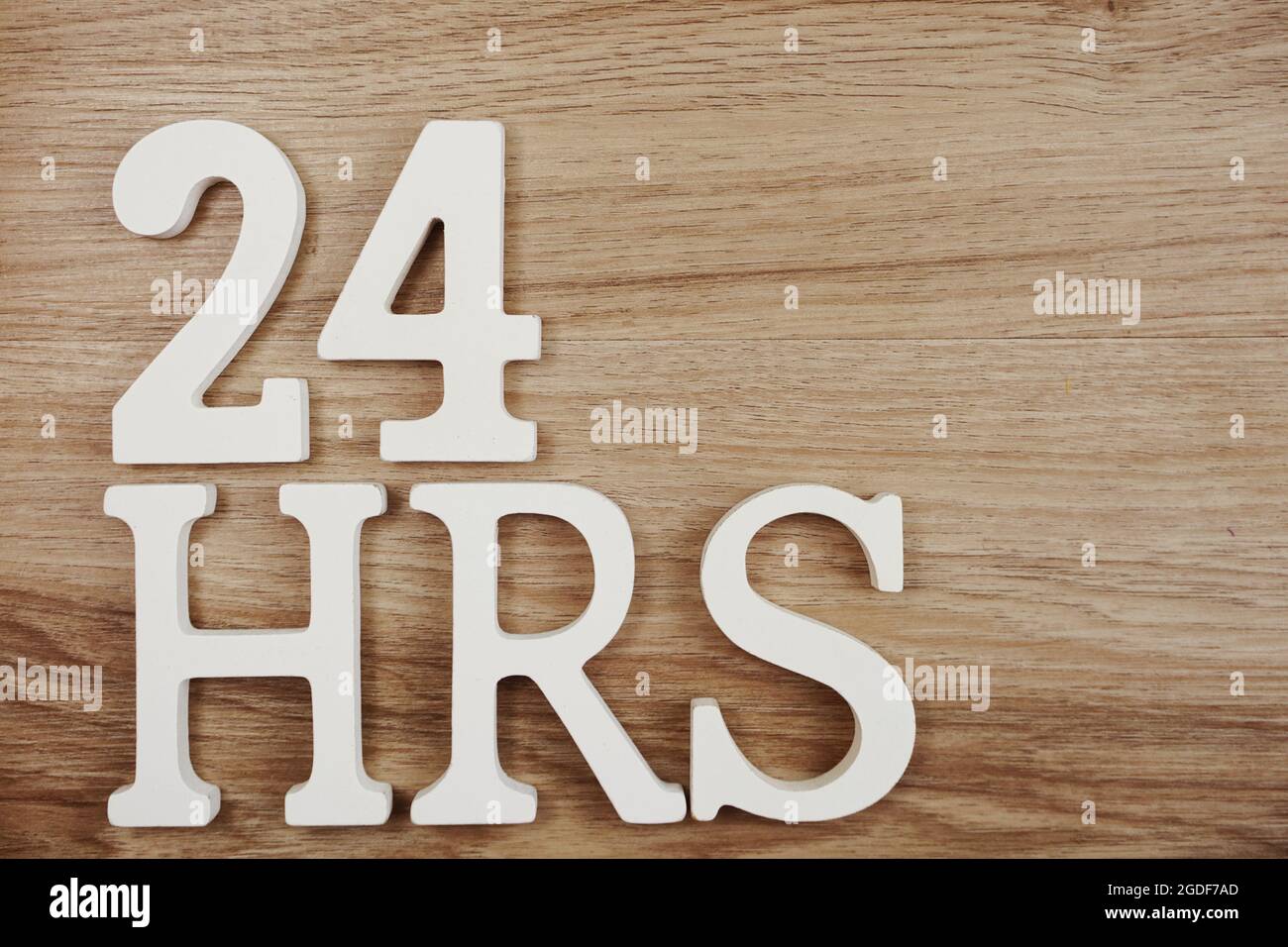 24 Hours alphabet letters on wooden background Stock Photo - Alamy